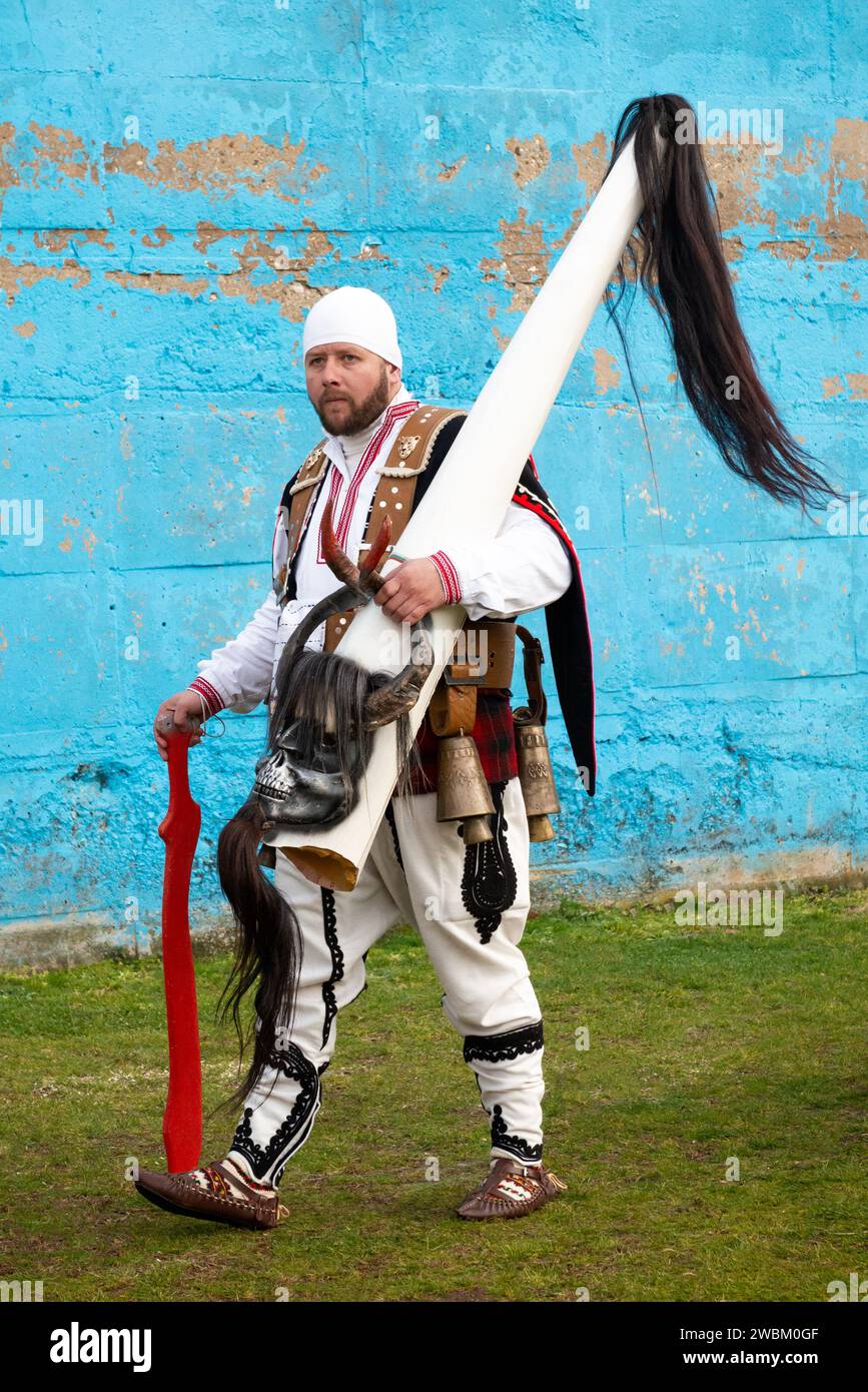 Unmasked Kukeri dancer from Central Bulgaria with intricate costume and ...