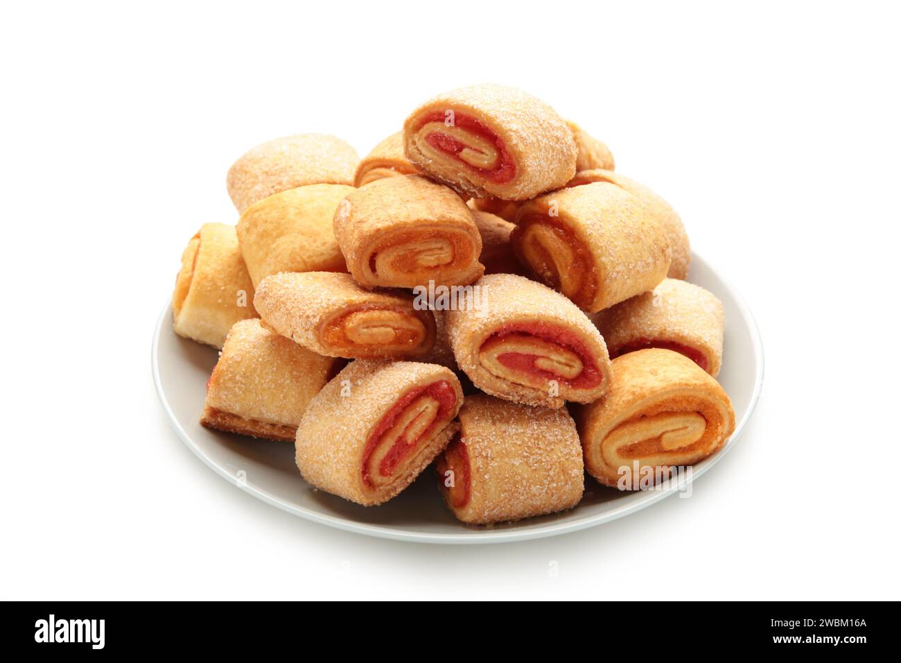 Homemade cookies, mini rolls with apricot jam isolated on white ...