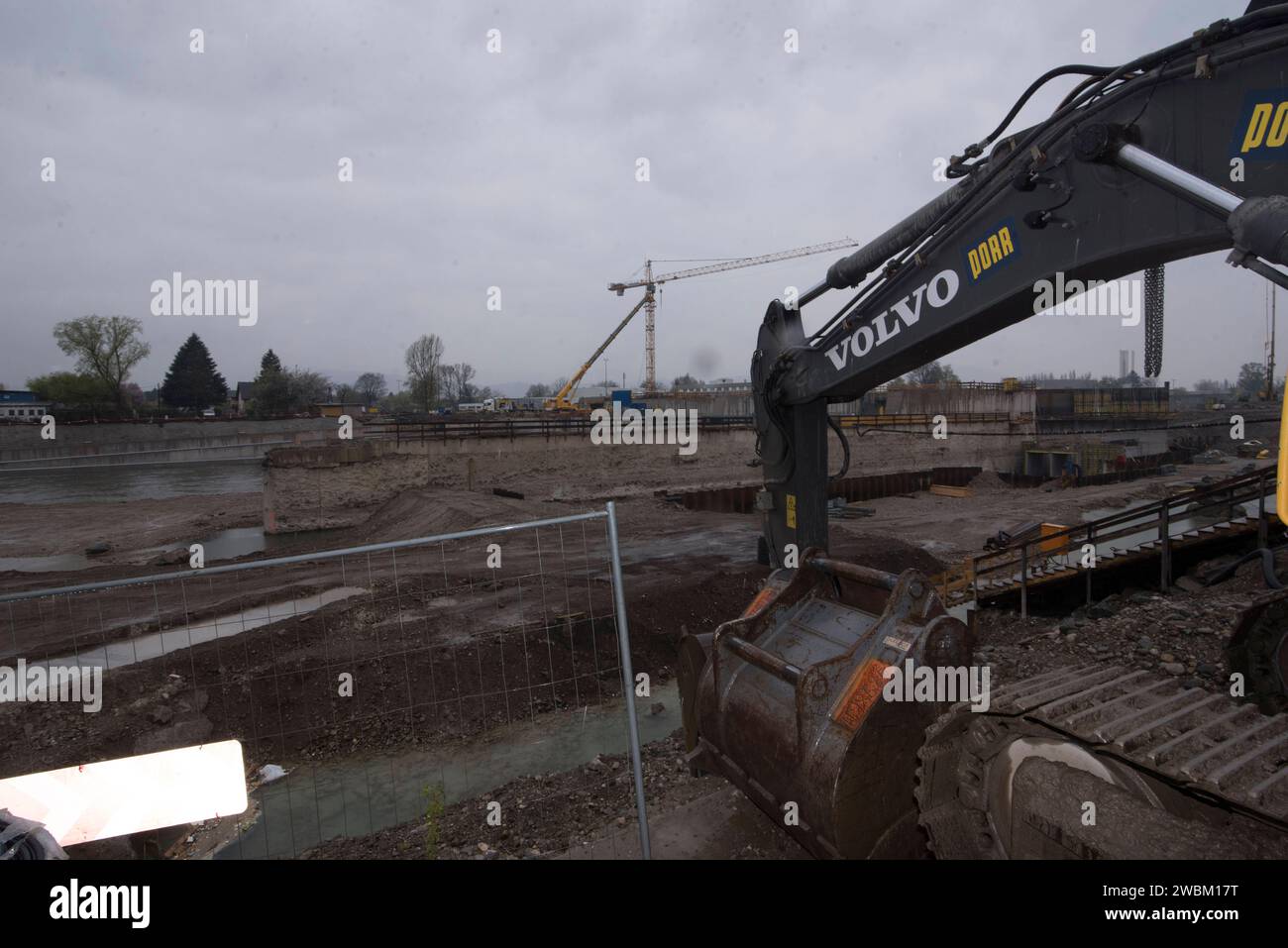volvo excavator at a construction site, heavy machinery for earthworks ...