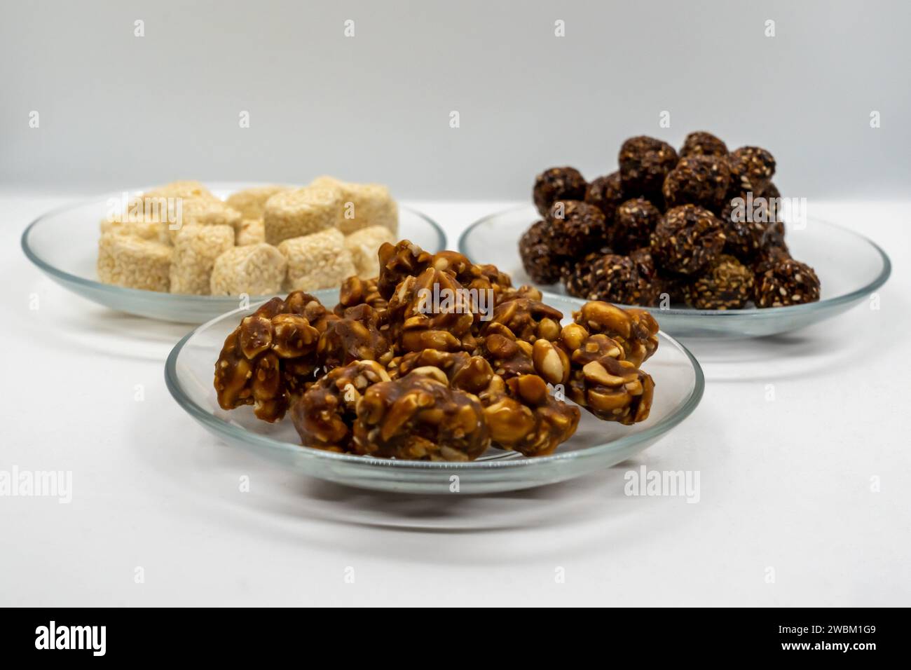 Three Plates Full of Sesame Ladoo, Til ko Laddu, Jaggery Peanuts Laddoo ...