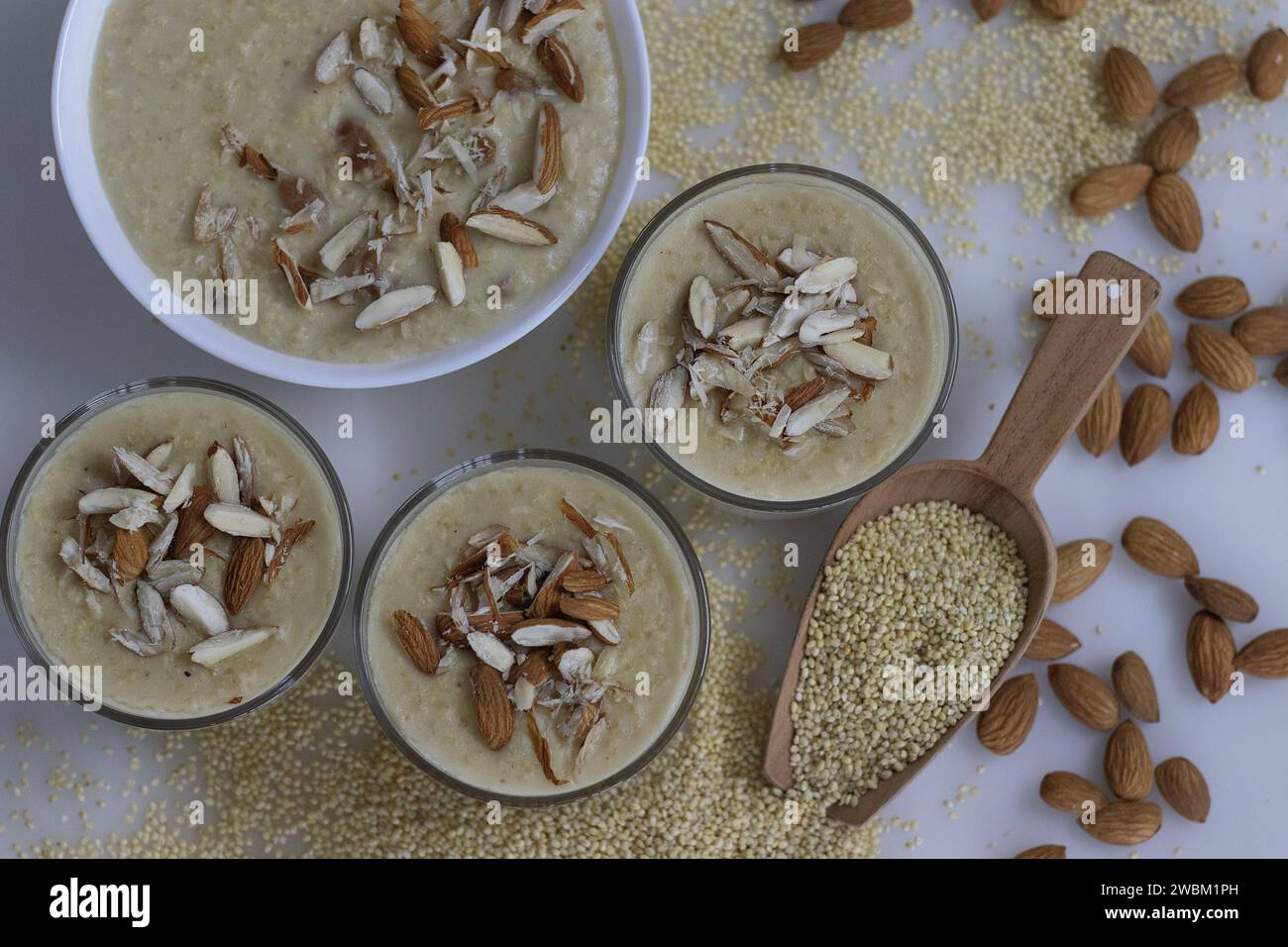 Delicious Proso Millet Kheer in a glass bowl, adorned with crunchy ...