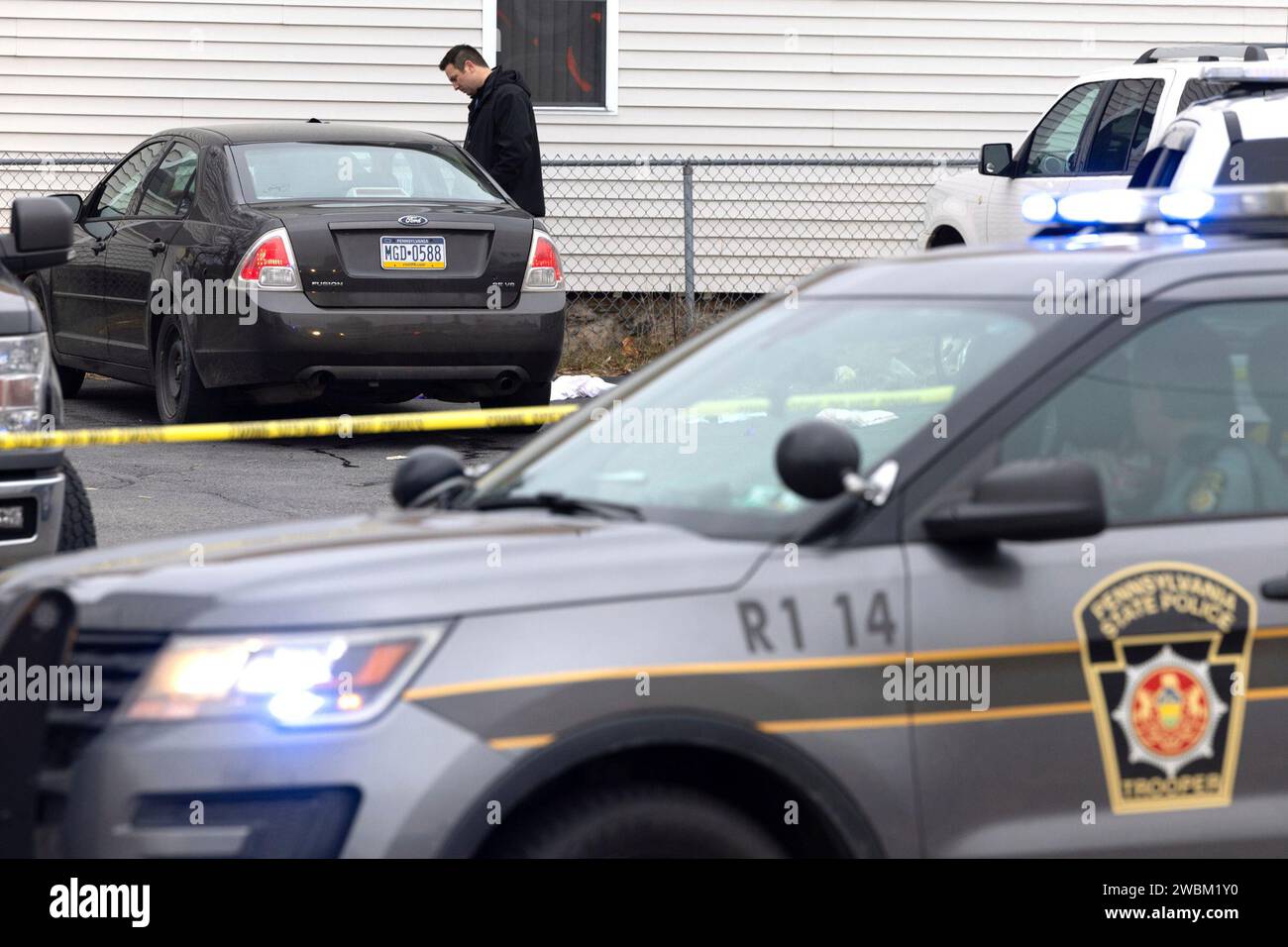 A Pennsylvania State Trooper investigates the scene after a Scranton ...