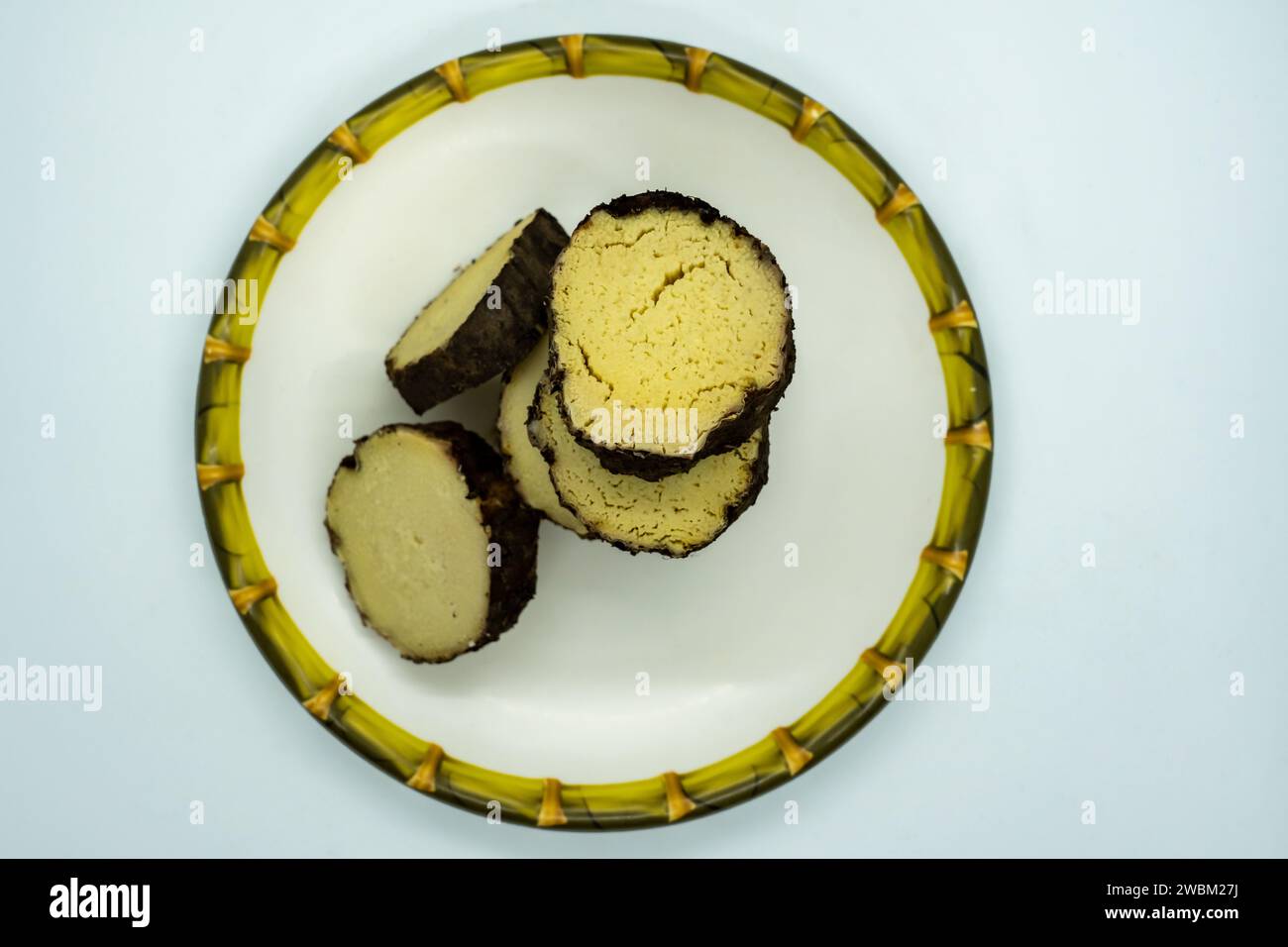 A Plate full of Fibrours Root of Purplish yellow Yam aka Tarul Stock ...