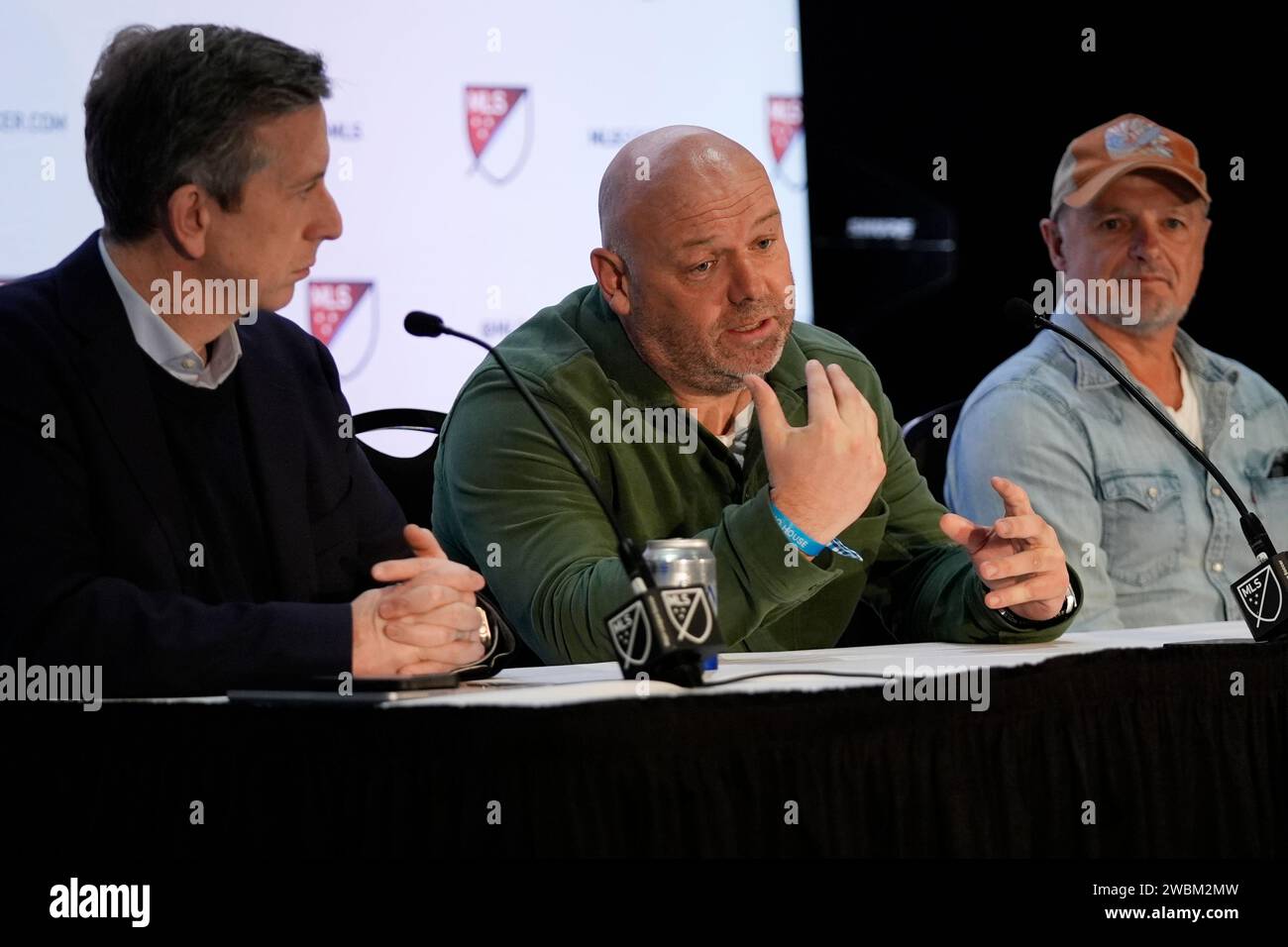 Paul Martin, center, co-founder of Box to Box Films, speaks during a ...