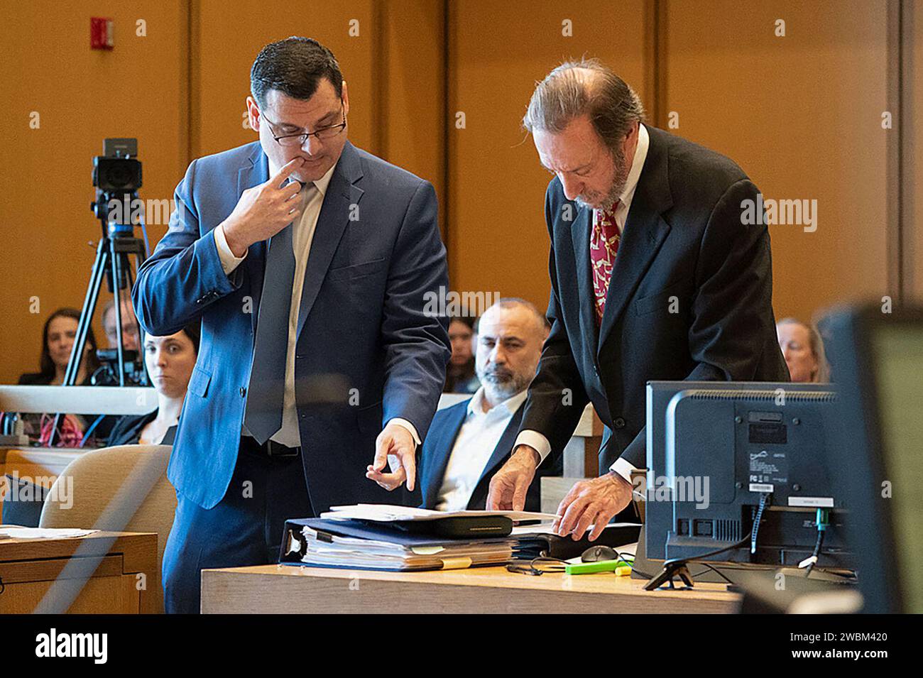 Sean McGuinness, attorney for the prosecution, left, and defense ...