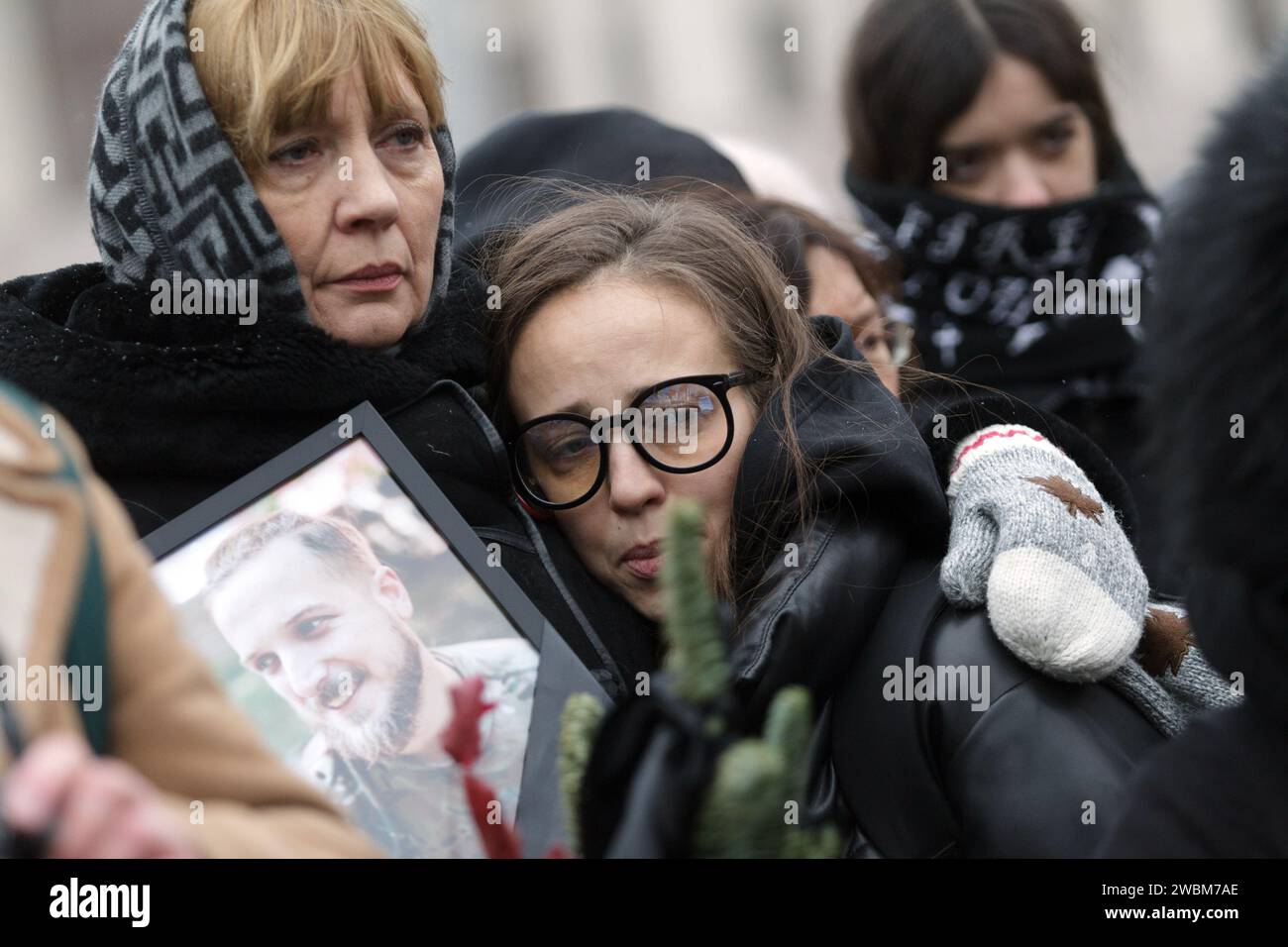 KYIV, UKRAINE - JANUARY 11, 2024 - Women share an embrace during a ...