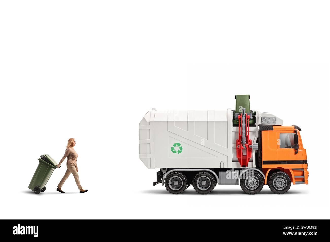 Woman pulling a bin towards a garbage truck isolated on white ...
