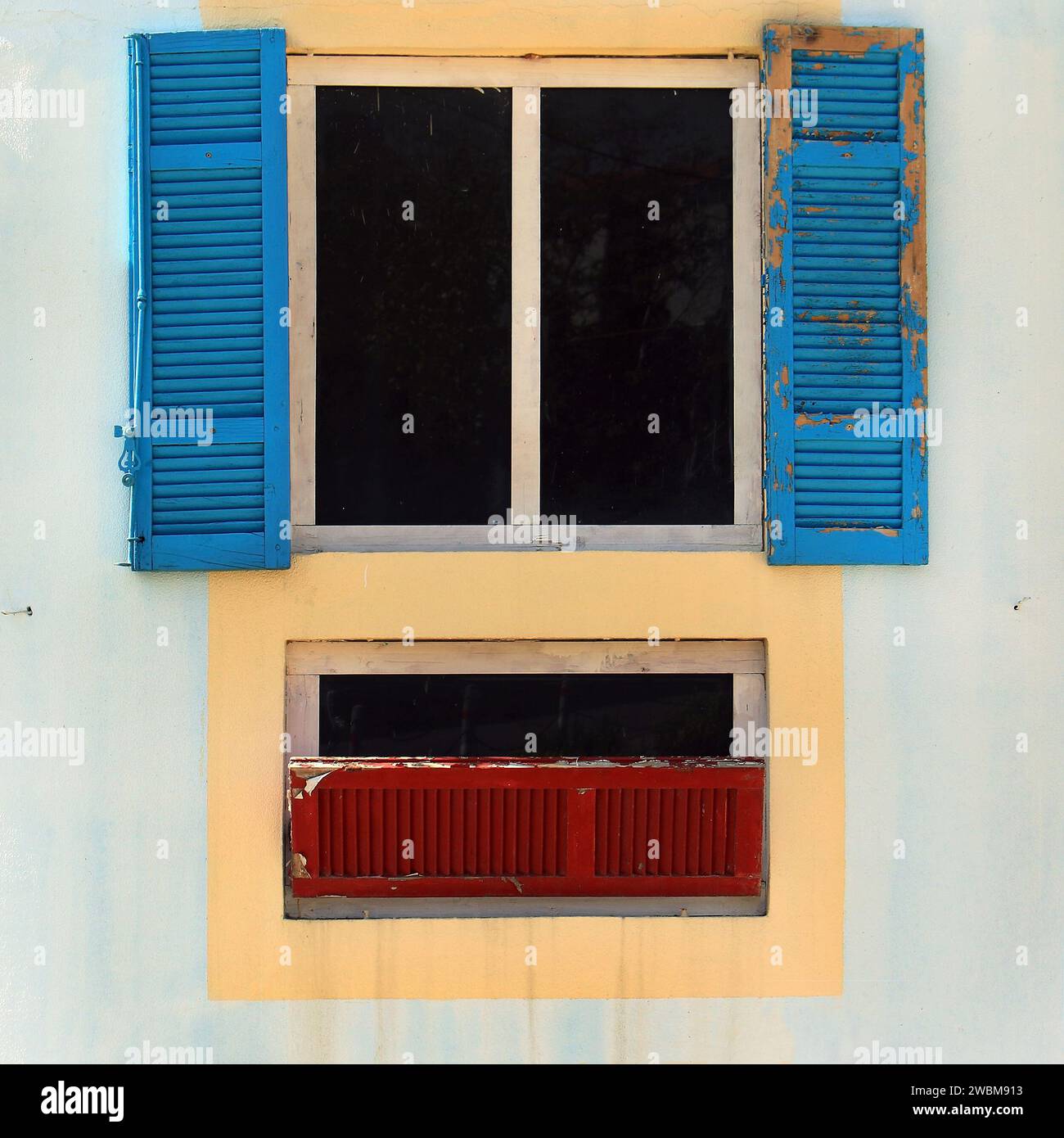 Blue and red windows with different shapes Stock Photo - Alamy