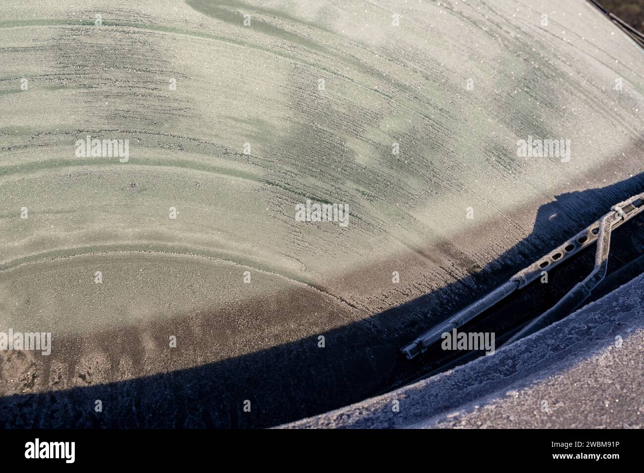 Frost on the car screen during winter season Stock Photo - Alamy