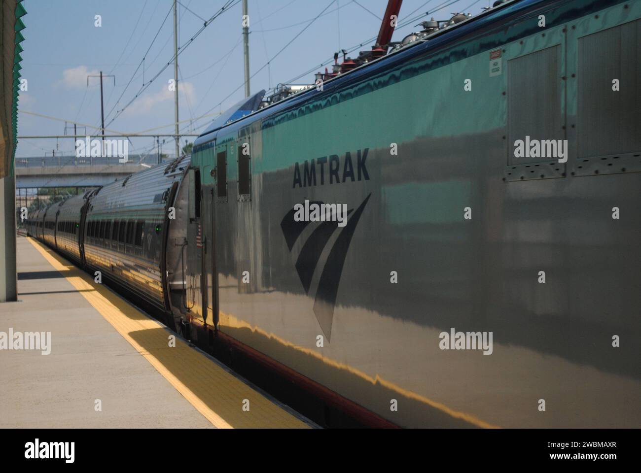 A photo of an Amtrak Northeast Regional train going through the ...