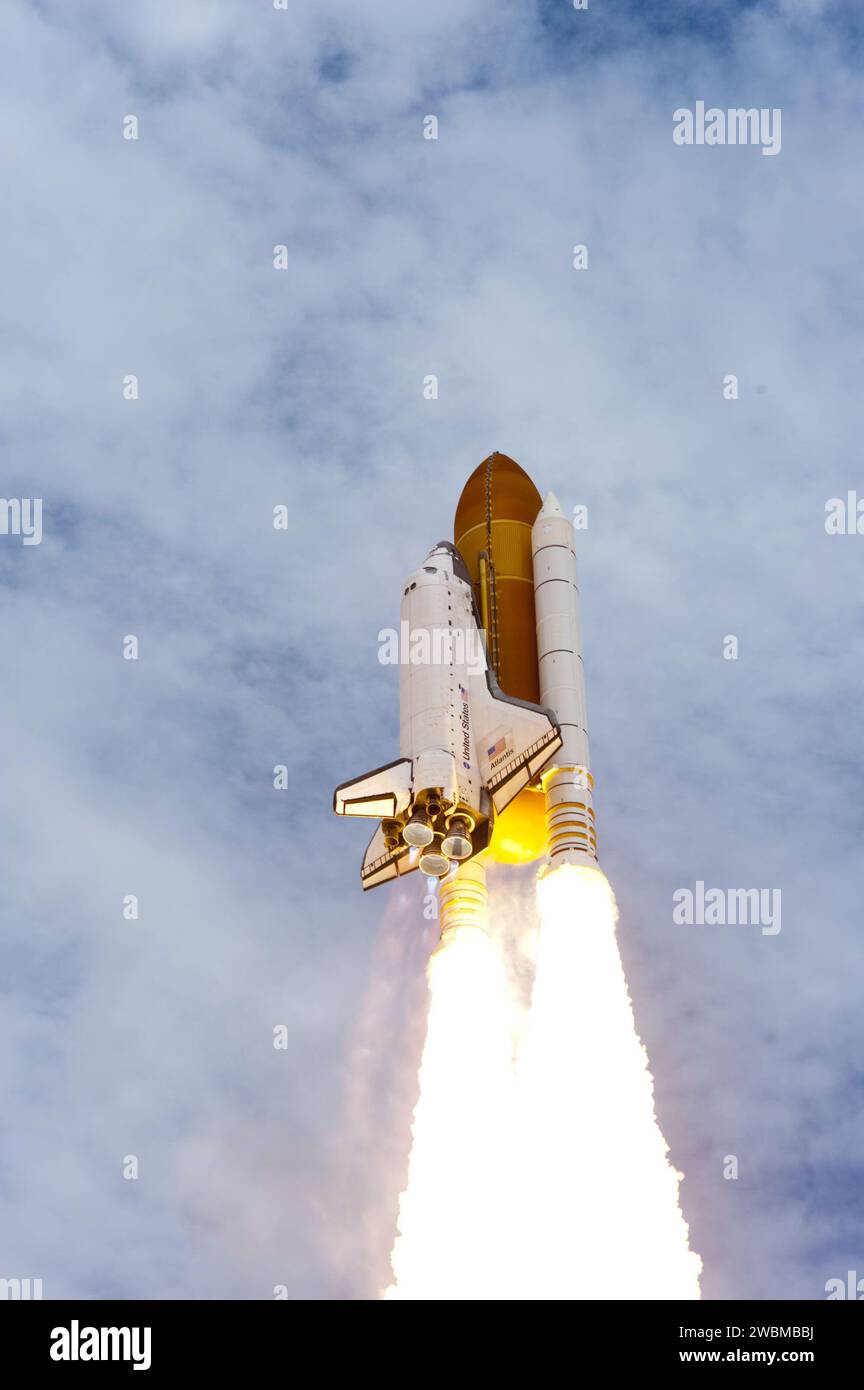 CAPE CANAVERAL, Fla. -- Solid rocket motors blazing, space shuttle ...