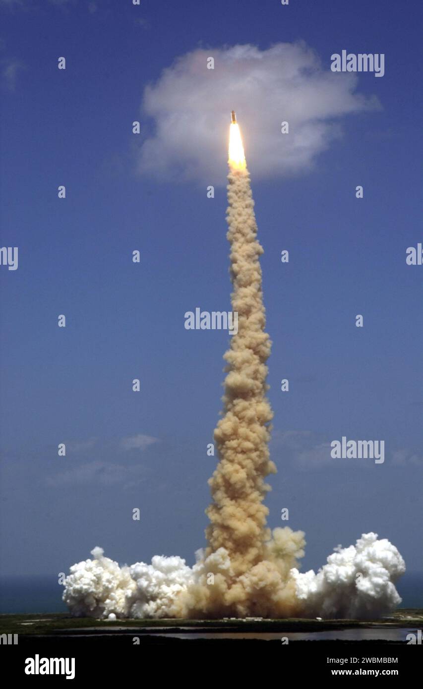 KENNEDY SPACE CENTER, FLA. -- Like a humming bird flying from the ...