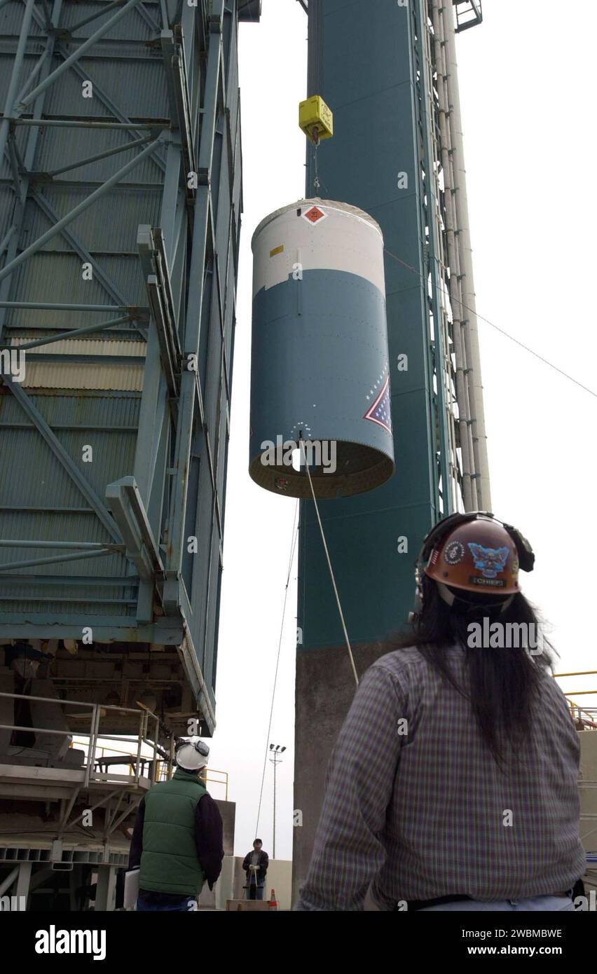 The interstage of a Boeing Delta II rocket is lifted on the gantry at ...