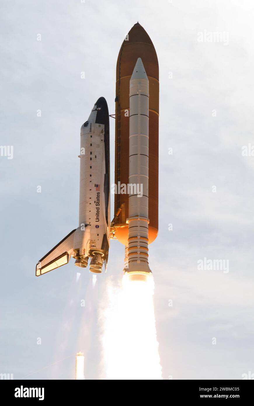 CAPE CANAVERAL, Fla. – Fiery columns propel space shuttle Endeavour ...