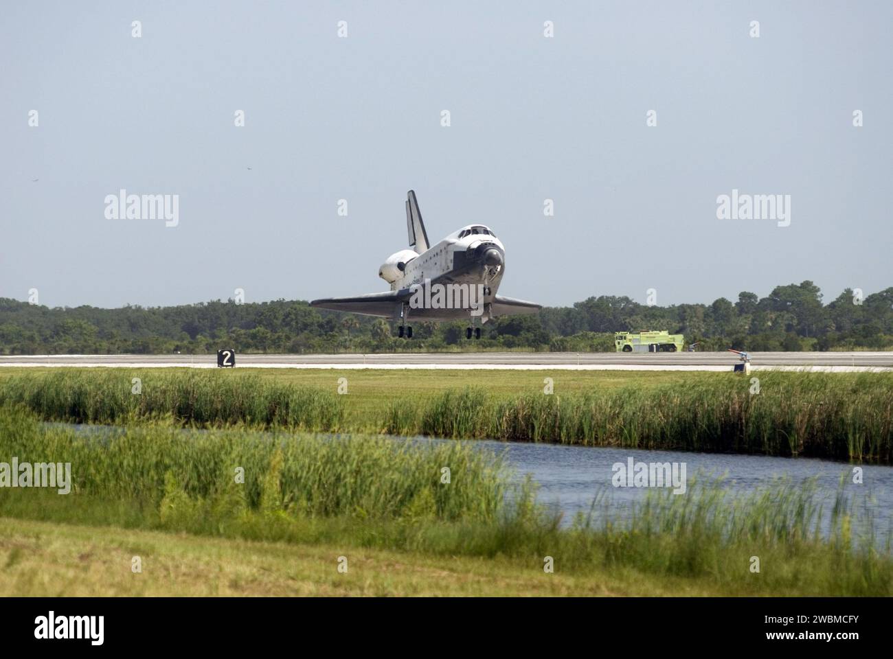 Space Shuttle Endeavour lands at Kennedy Space Center, completing the ...