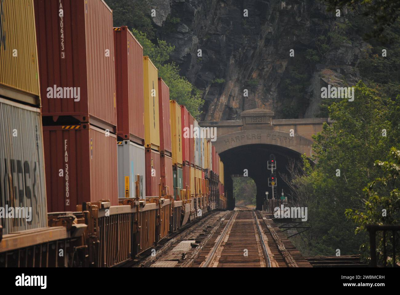 Here is a photo of a double stack intermodal CSX train passing through ...