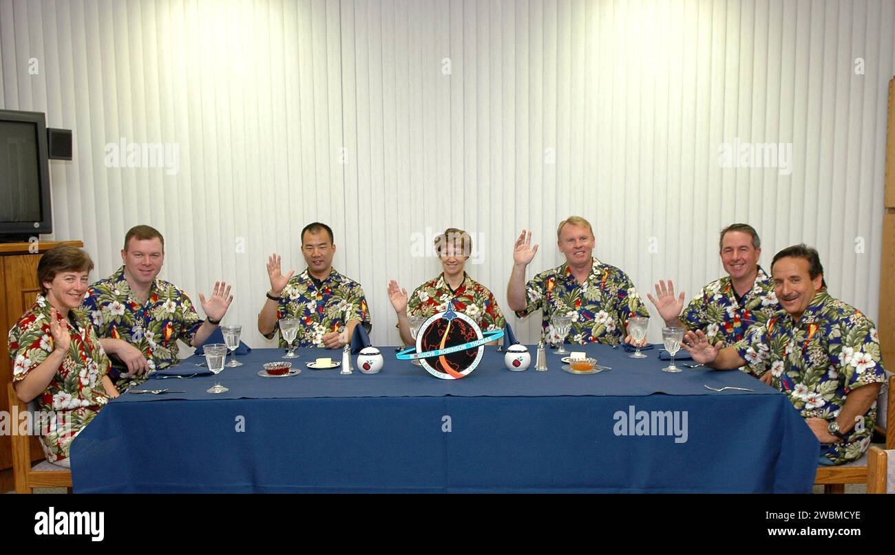 The STS-114 crew at Kennedy Space Center has breakfast and participates ...