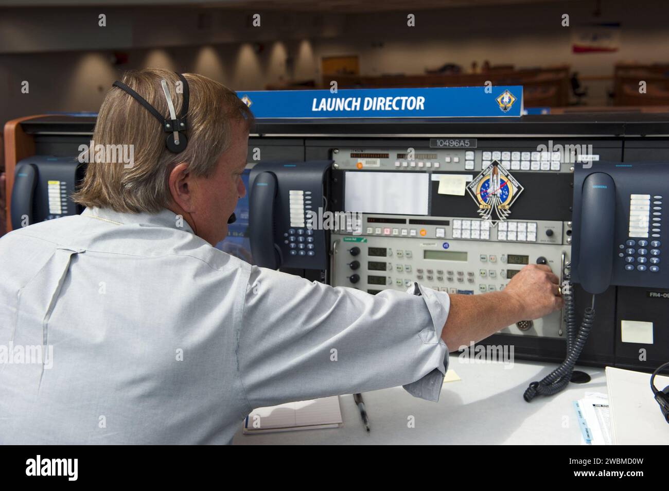 Launch Director Mike Leinbach monitored the countdown in Firing Room 4 ...