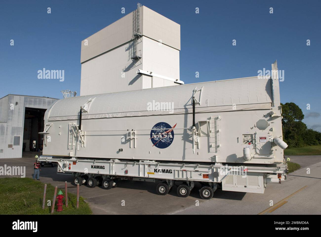 CAPE CANAVERAL, Fla. -- Payload canister #2 departs the high bay of the ...