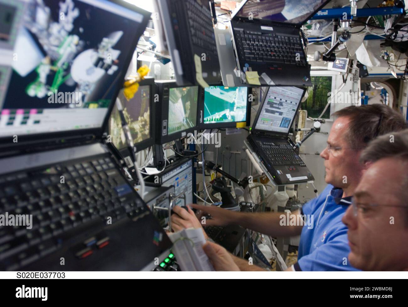 Astronauts Robert Thirsk and Kevin Ford operated the Canadarm2 robotic ...