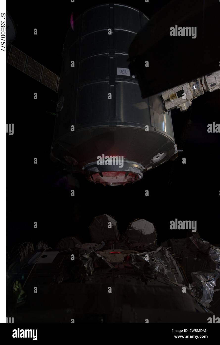 S133-E-007577 (1 March 2011) --- In the grasp of the International ...