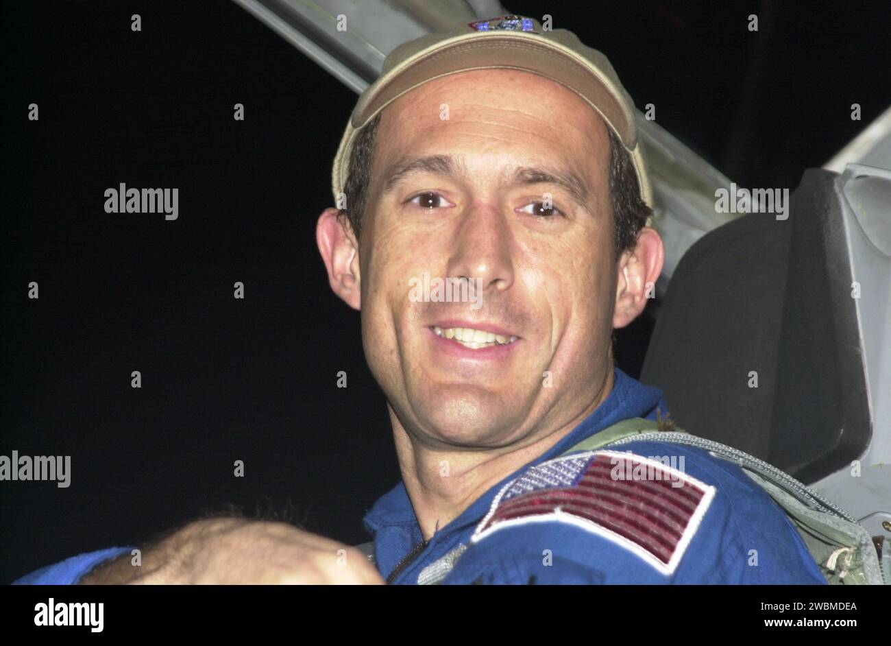 KENNEDY SPACE CENTER, Fla. - STS-109 Mission Specialist James Newman ...