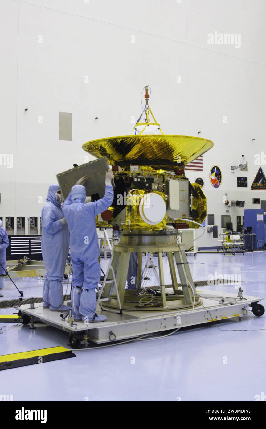 Technicians at Kennedy Space Center installed panels on New Horizons to ...