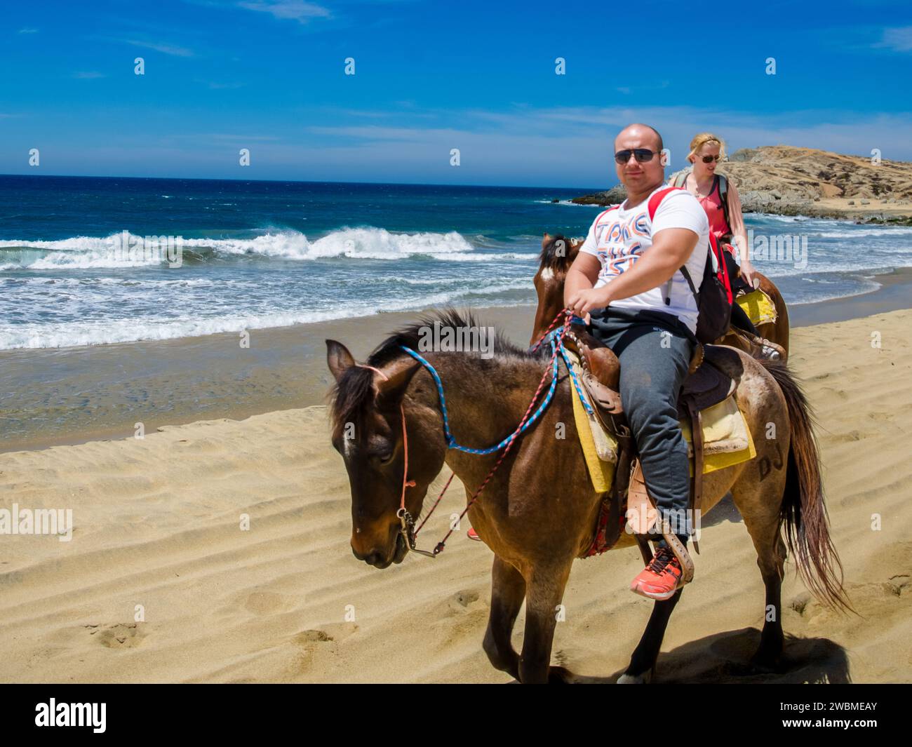 Horseback riding on the beach in Cabo San Lucas, Mexico Stock Photo - Alamy