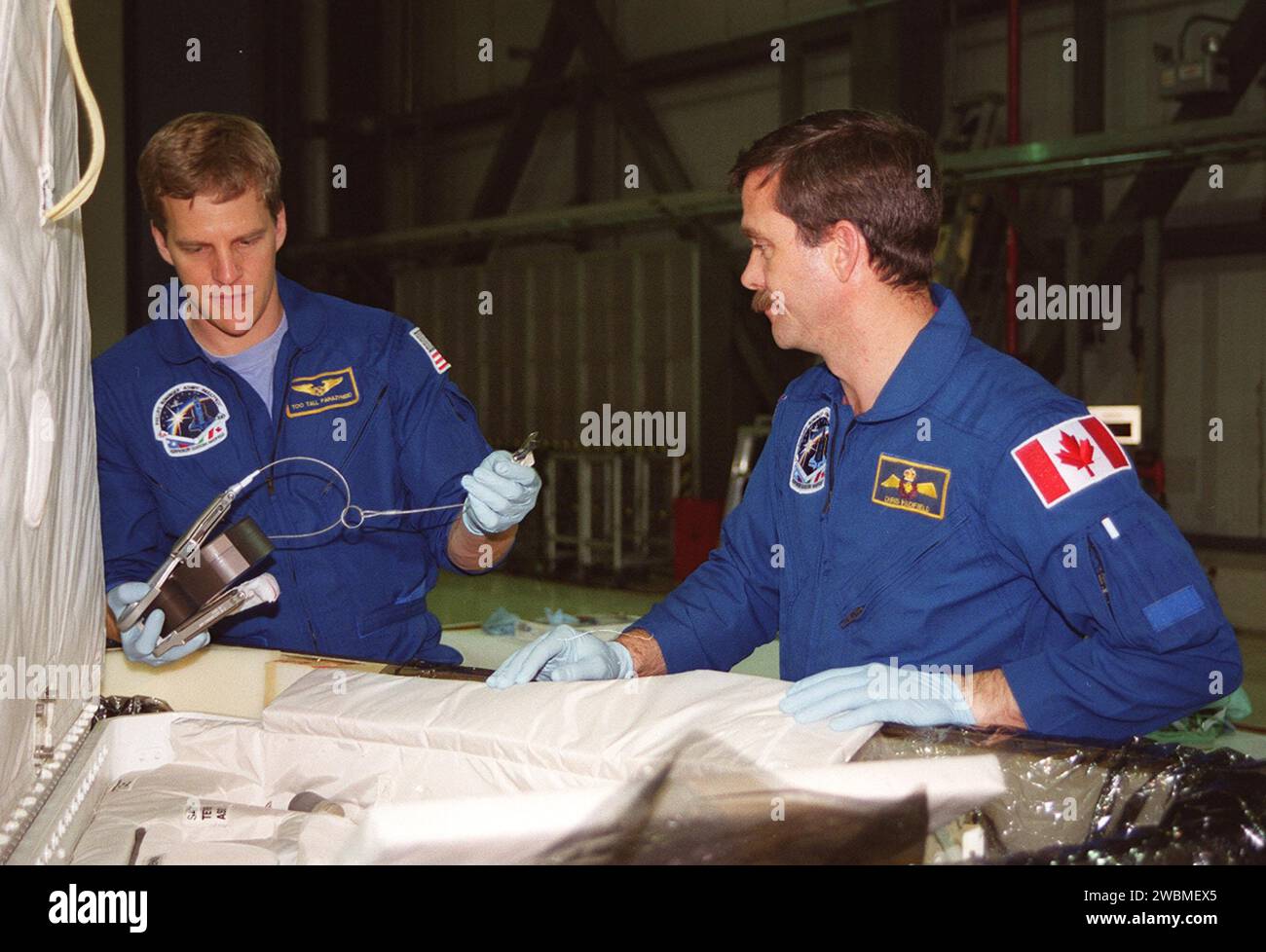 Mission Specialists Scott Parazynski and Chris Hadfield of the Canadian ...