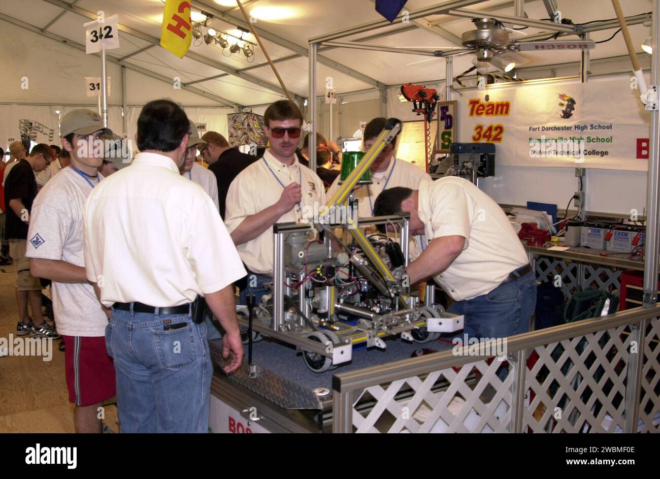Getting ready for preliminary heats, students and mentors prepare their ...