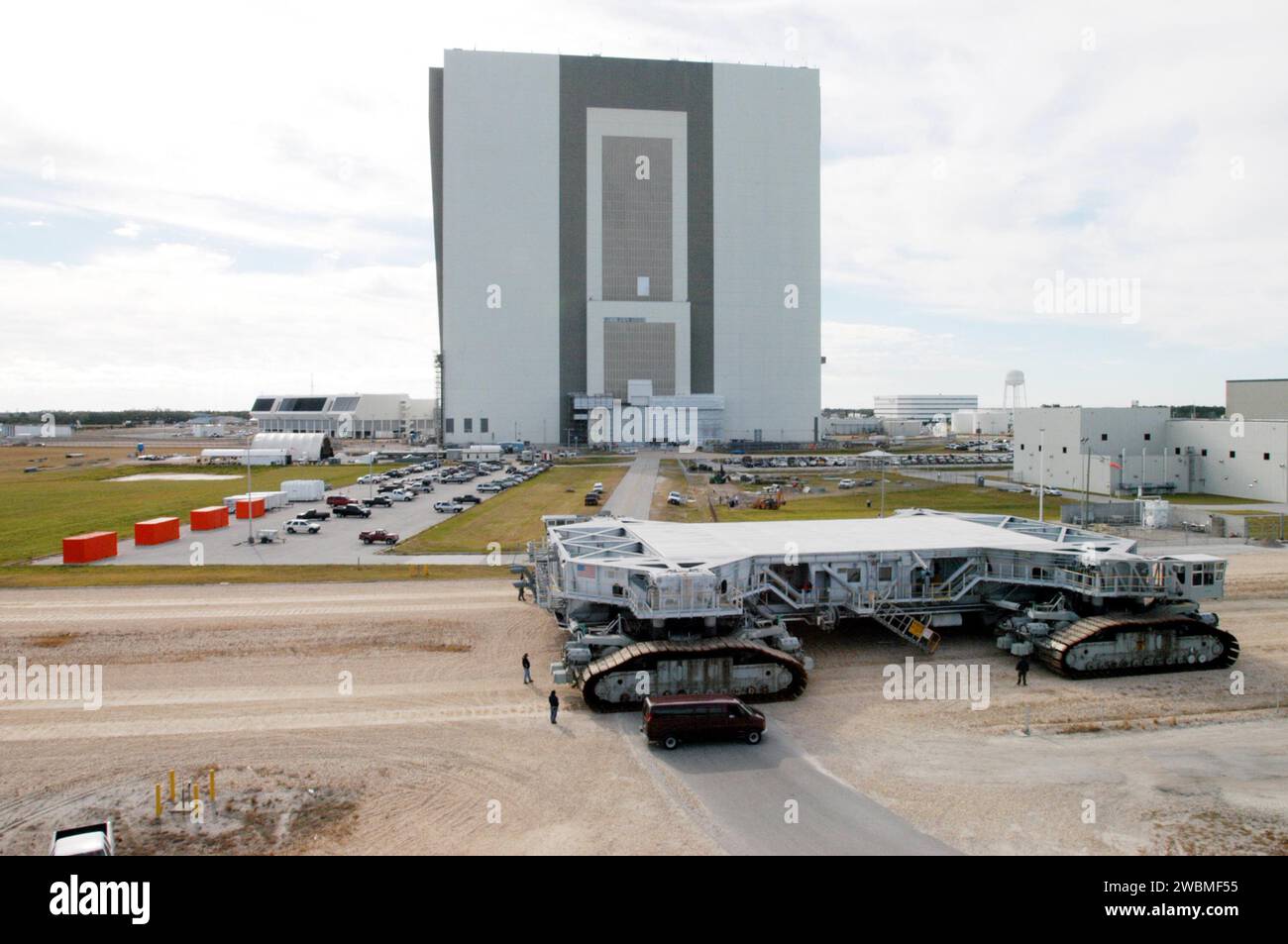 KENNEDY SPACE CENTER, FLA. - The Crawler Transporter sits behind the ...