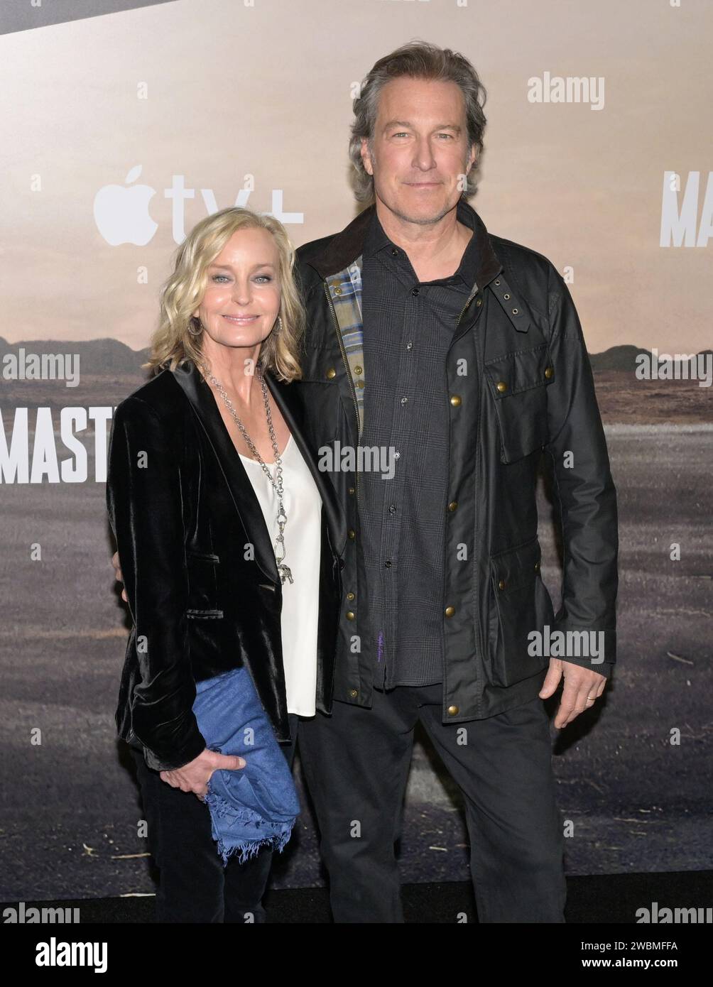 January 10, 2024, Westwood, California, USA: BO DEREK, left, and husband JOHN CORBETT attend the ...