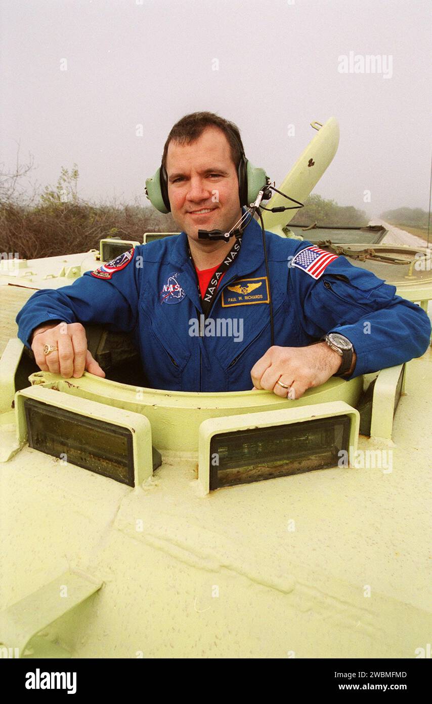 STS-102 Mission Specialist Paul Richards is ready to drive the M-113 ...