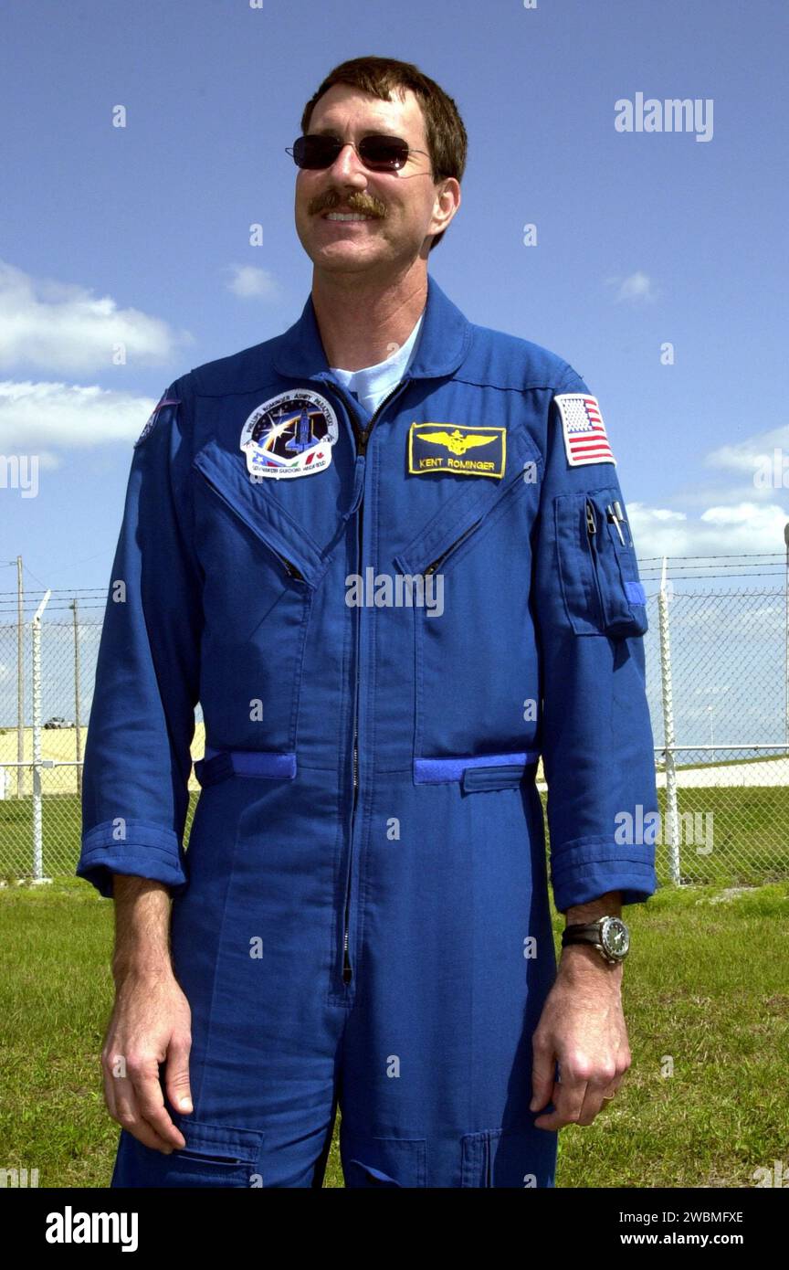 KENNEDY SPACE CENTER, FLA. -- STS-100 Commander Kent V. Rominger stands ...