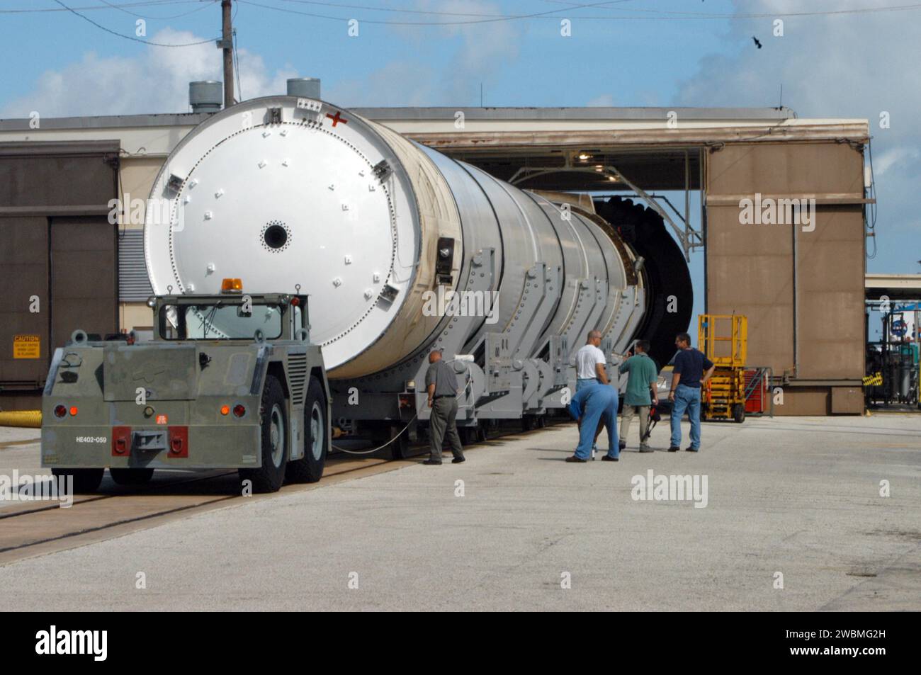 KENNEDY SPACE CENTER, FLA. - Workers in Hangar AF at Cape Canaveral Air ...