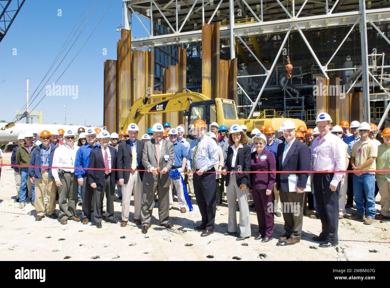 NASA, Orbital Sciences, and Aerojet officials conduct a ribbon-cutting ...