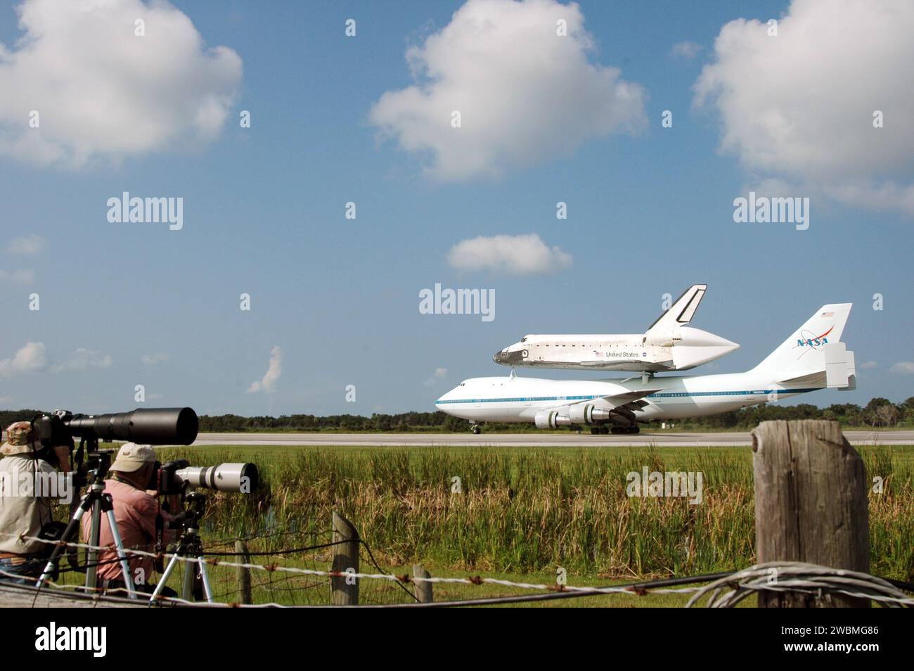 Space Shuttle Discovery, atop a modified Boeing 747 Shuttle Carrier ...