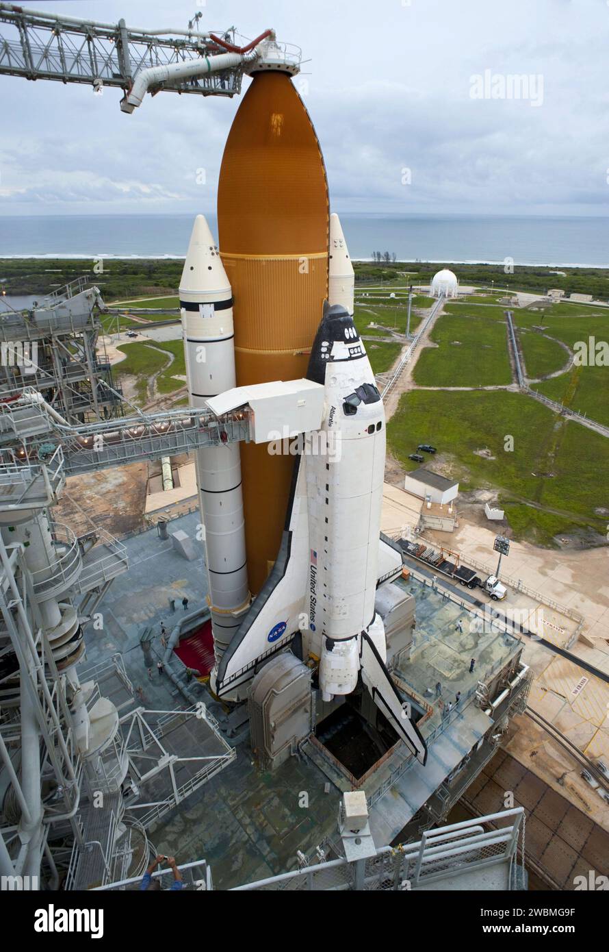 STS135-S-115 (8 July 2011) --- Space shuttle Atlantis, secured atop a ...