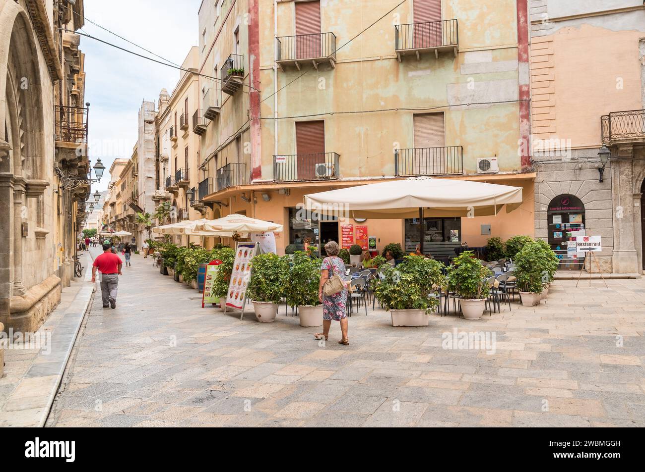 Trapani, Sicily, Italy - September 20, 2016: Street with outdoor bars ...