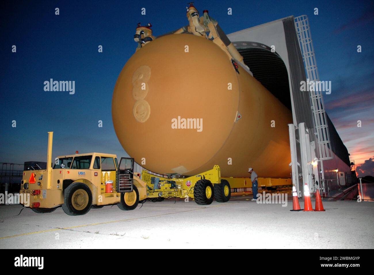 External Tank 119 is loaded onto a barge at Kennedy Space Center’s Turn ...