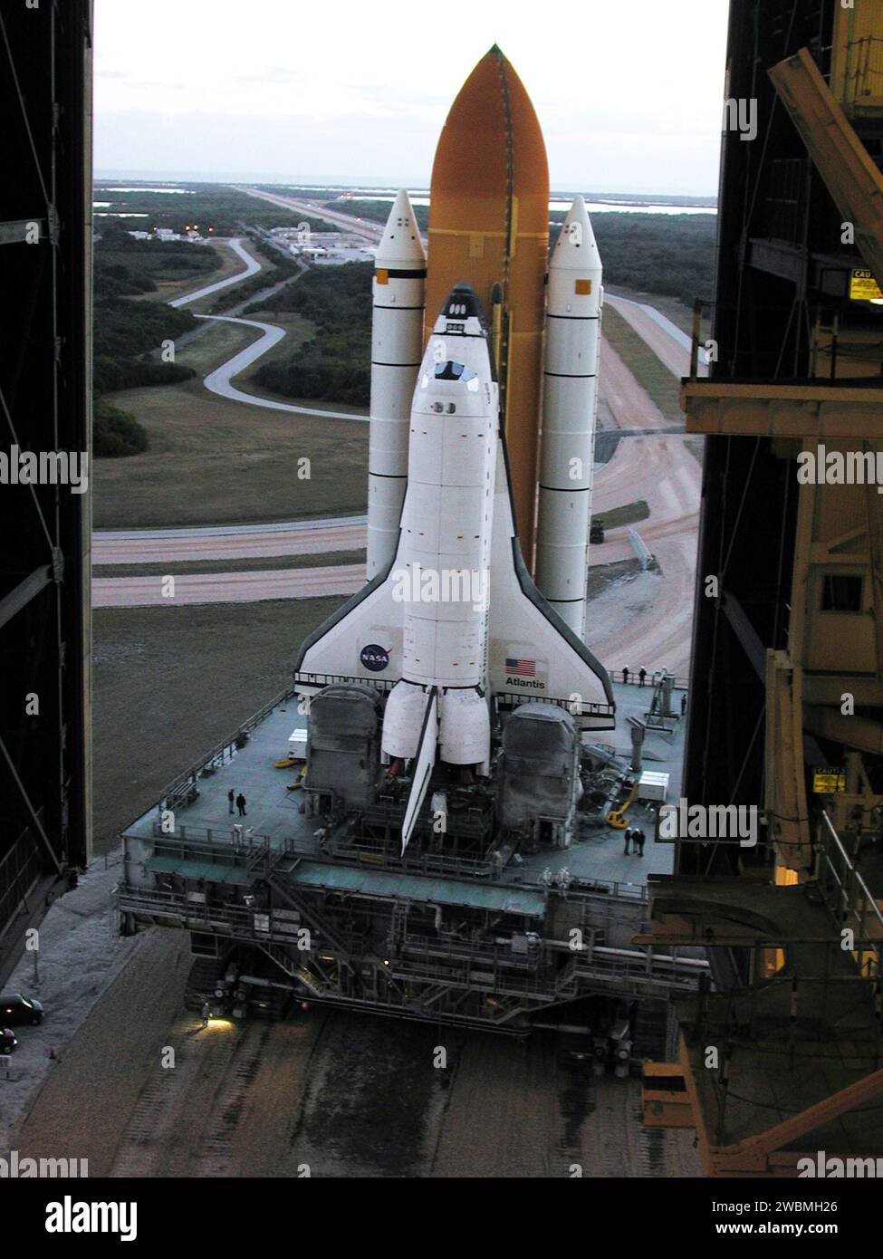 KENNEDY SPACE CENTER, Fla. -- Reflecting light from framework inside ...