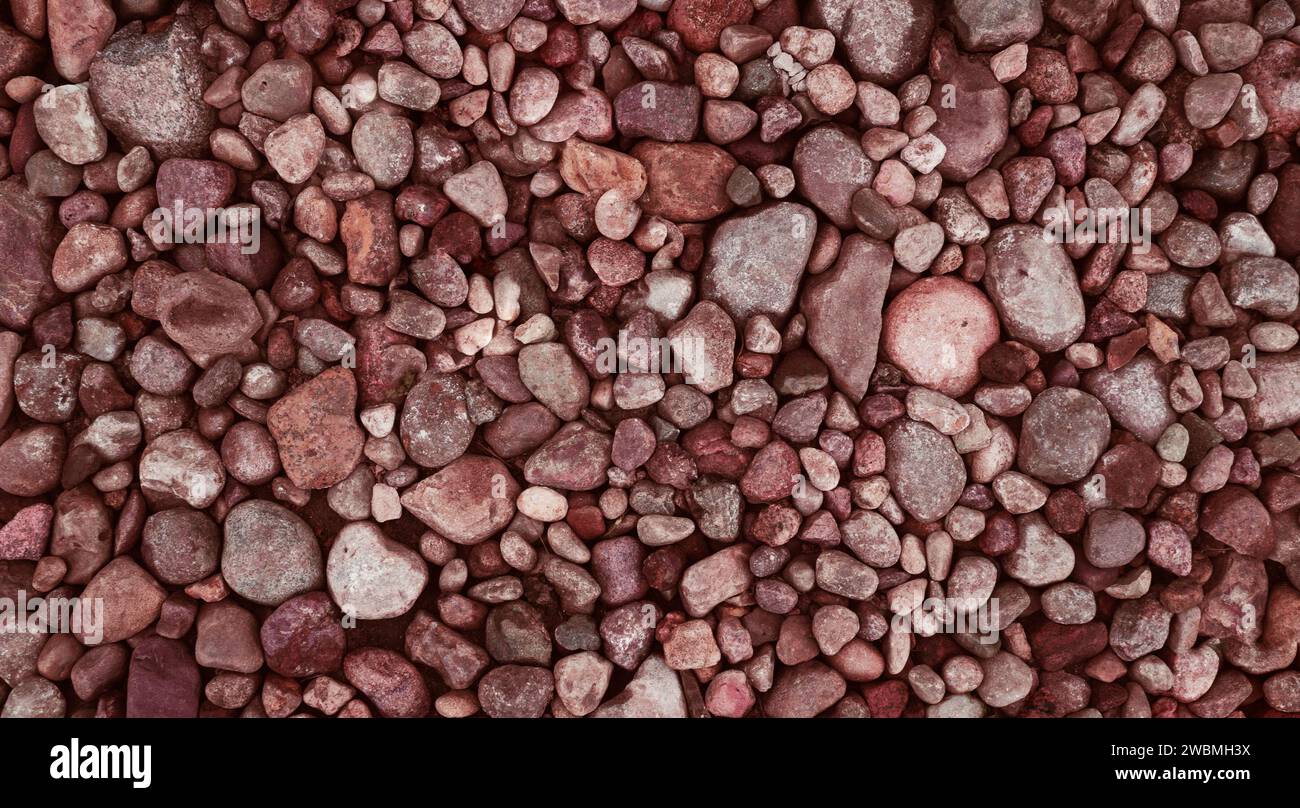 Natural rock pebble background shot Stock Photo - Alamy