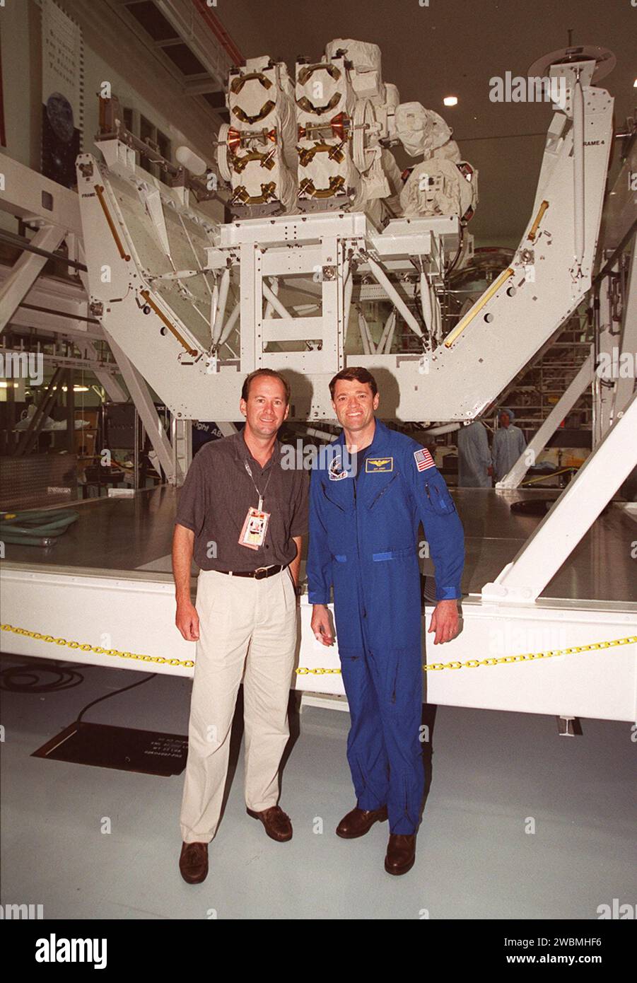 KSC’s PAO videographer, Glenn Benson (left) and STS-100 Pilot Jeffrey S ...