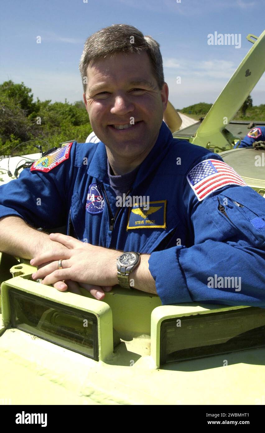 KENNEDY SPACE CENTER, FLA. -- STS-110 Pilot Stephen Frick waits inside ...