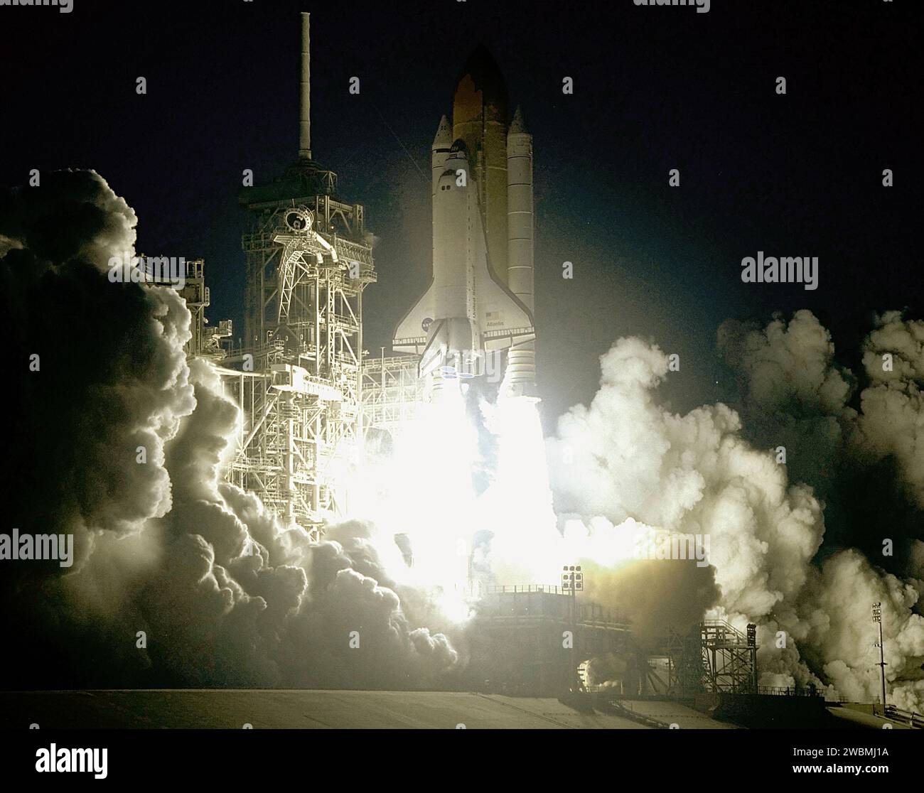 KENNEDY SPACE CENTER, FLA. -- Space Shuttle Atlantis pours flames and ...