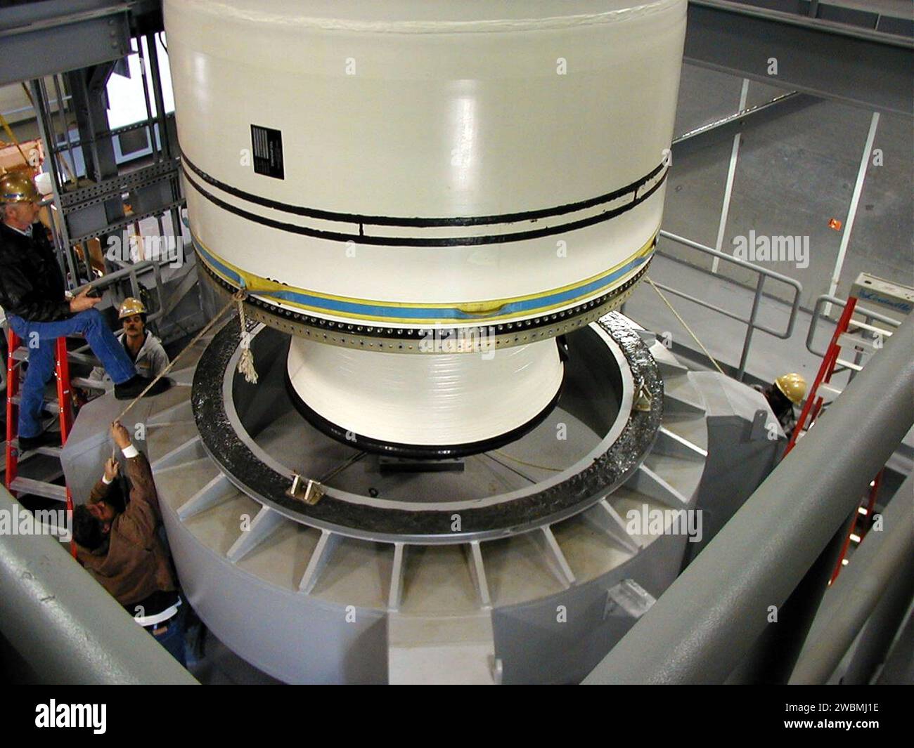 Castor 120 first stage of Athena 1 is lowered onto Kodiak Launch ...