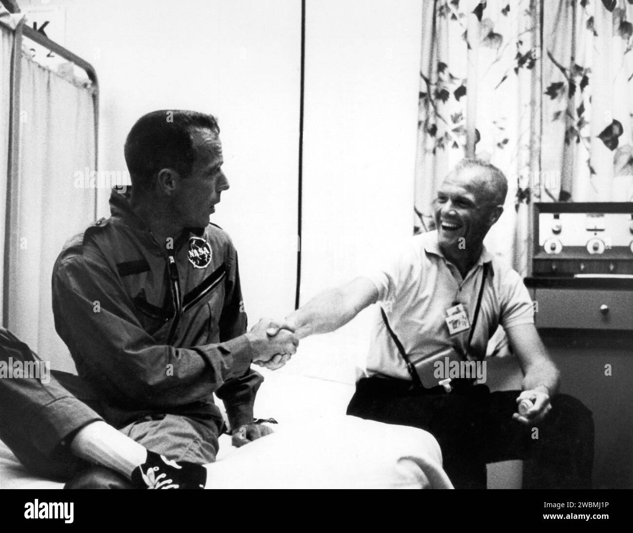 CAPE CANAVERAL, Fla. -- John Glenn congratulates Scott Carpenter on his ...