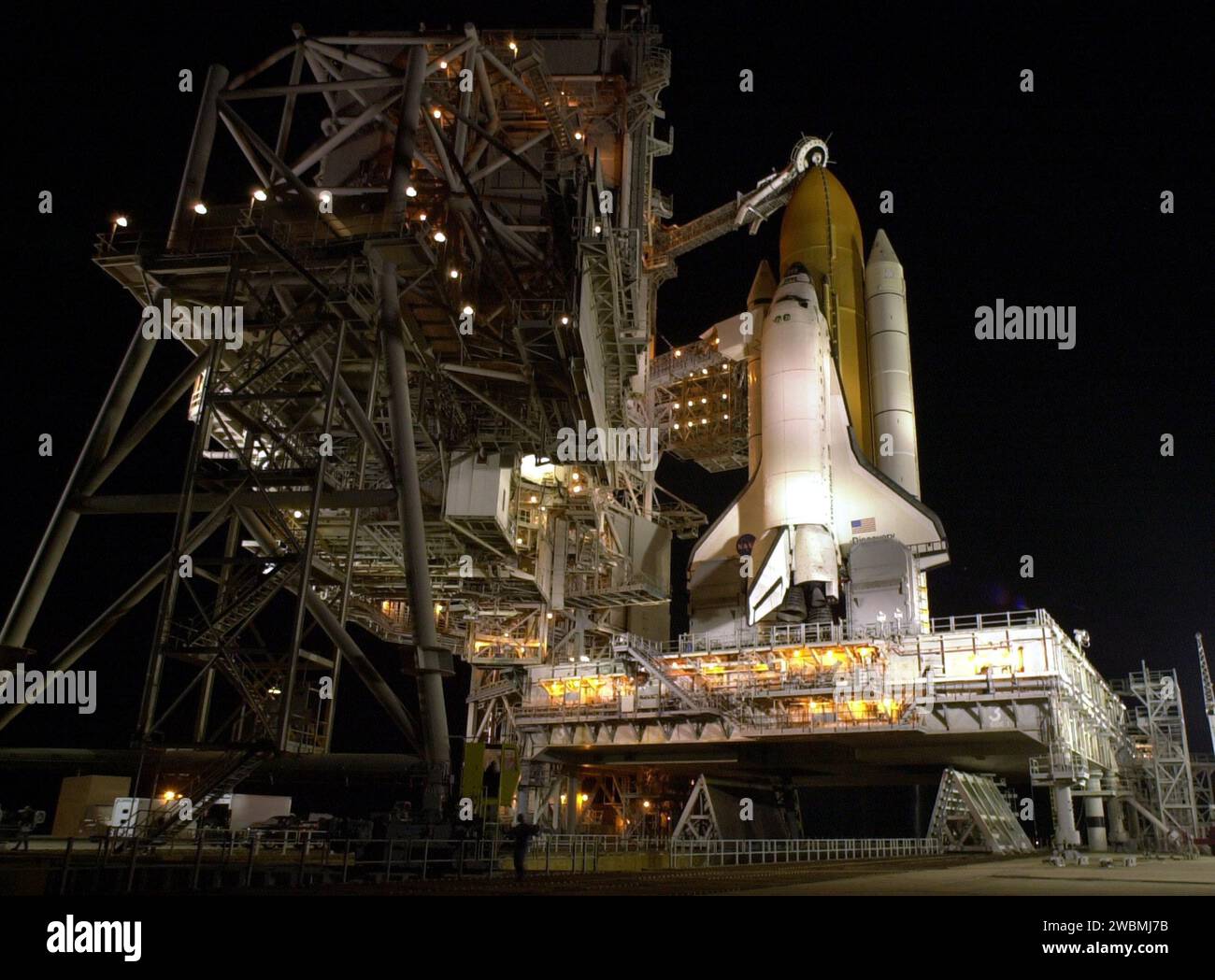 Space Shuttle Discovery is positioned for launch on STS-105 at Kennedy ...