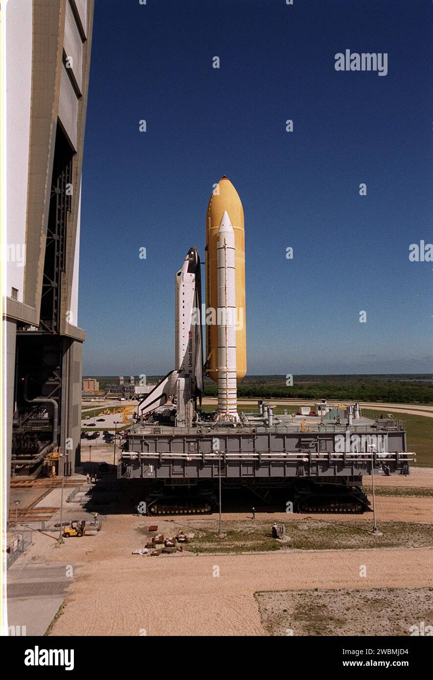 Endeavour rolls from VAB high bay 3 atop the Mobile Launcher Platform ...