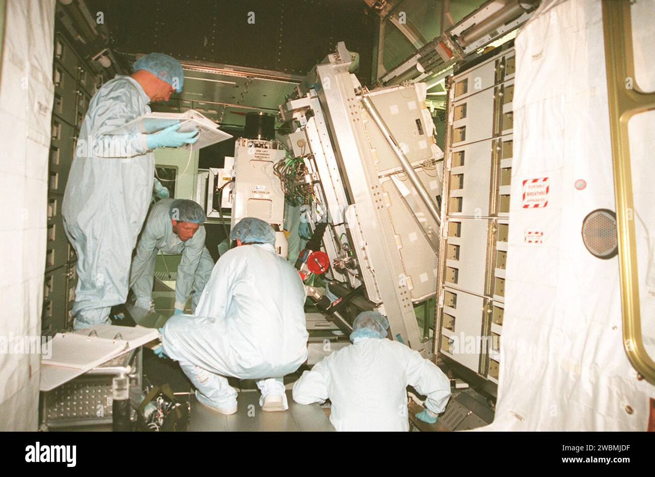 KENNEDY SPACE CENTER, FLA. -- Workers inside the Multi-Purpose ...